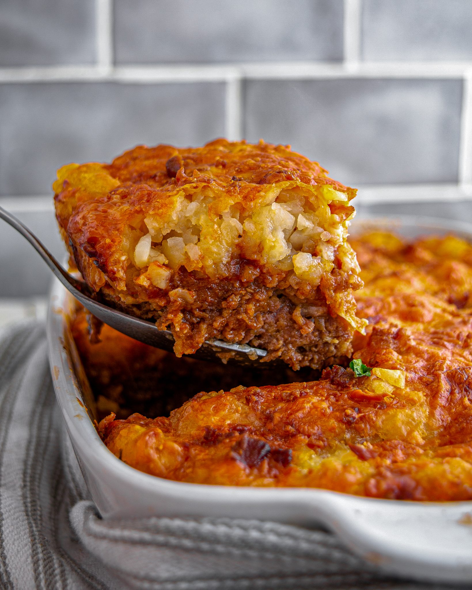 Cheesy Tater Tot Meatloaf Casserole - CheekyKitchen