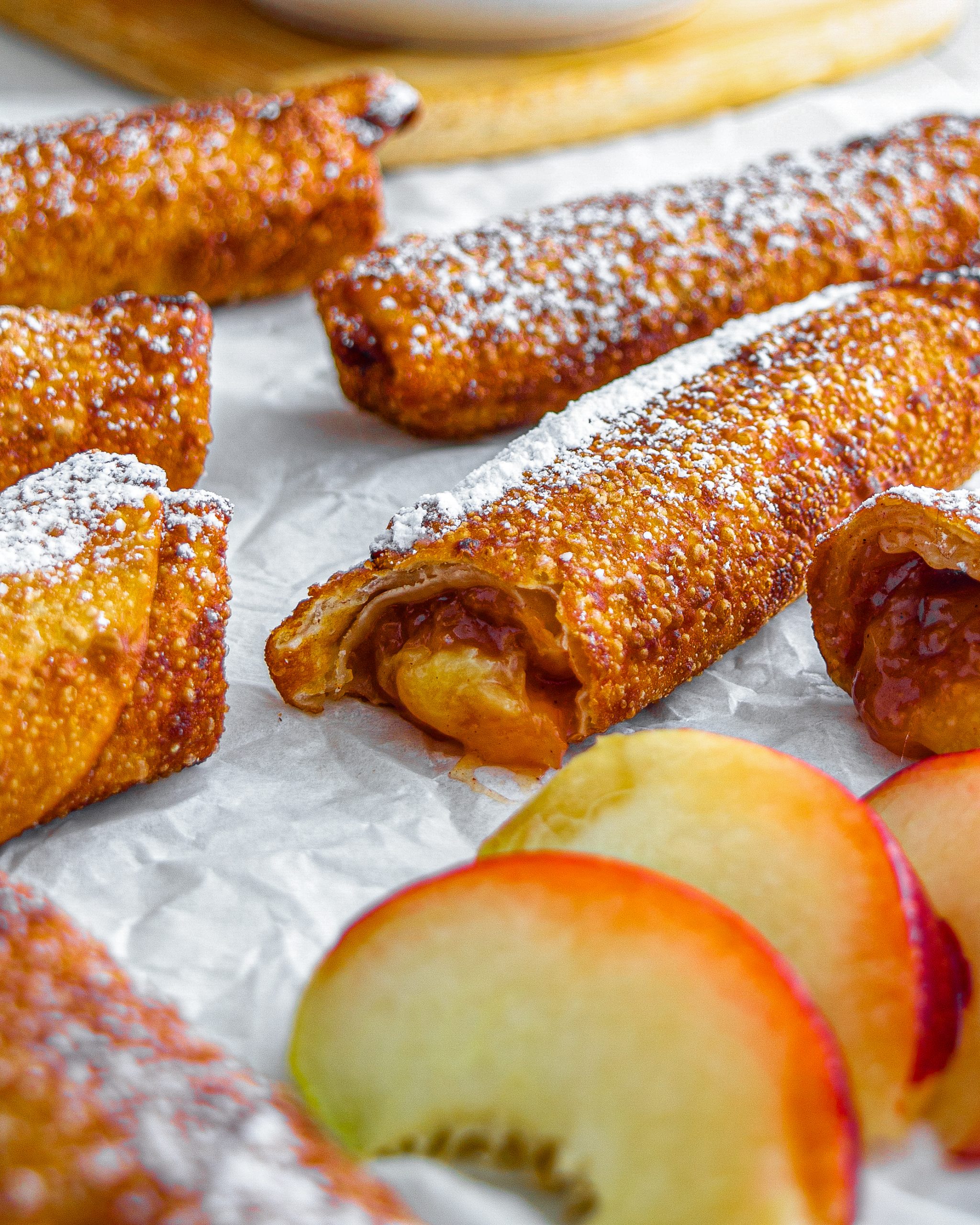 Peach Cobbler Egg Rolls - CheekyKitchen
